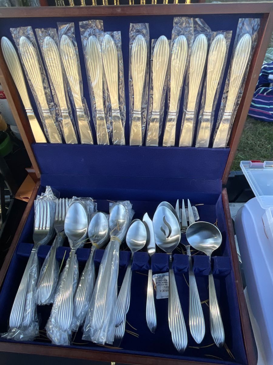 McSwain outside Estate Sale. 50% off starts on 4/21/2024