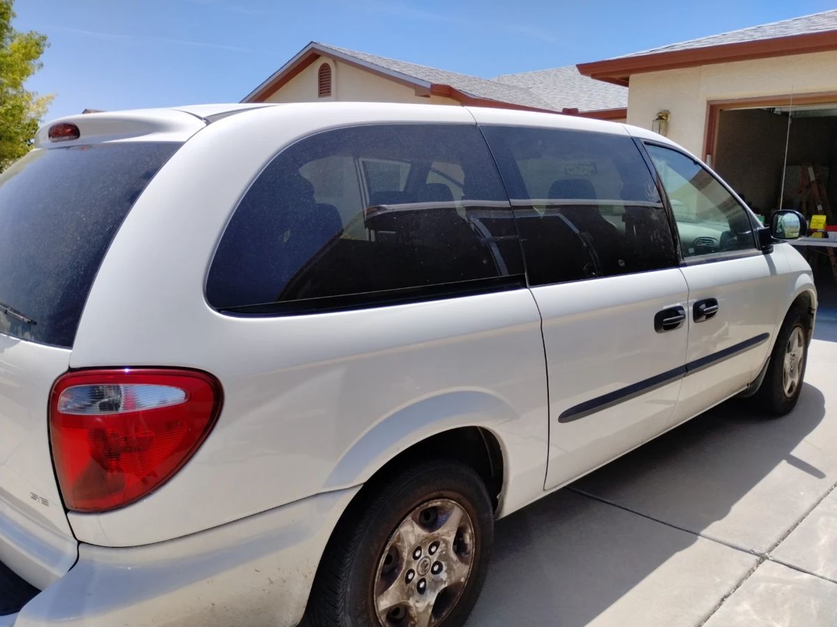 A 2003 Dodge Mini Van, a Huge Selection of... starts on 5/30/2025